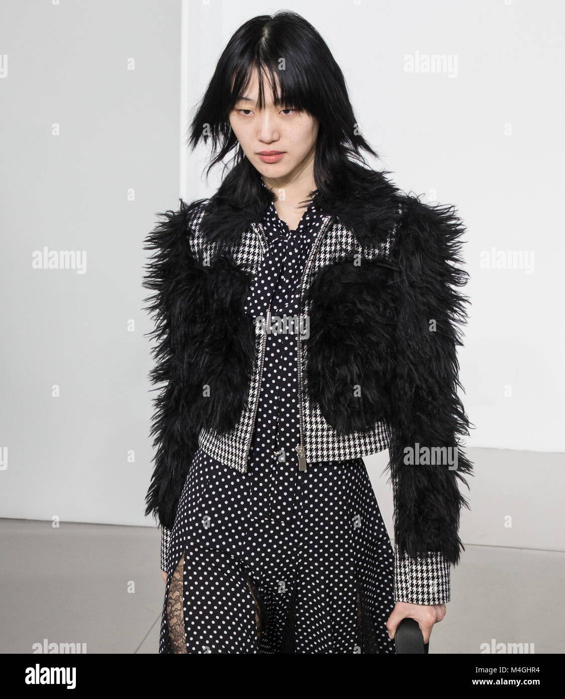 NEW YORK, NY - February 14, 2018: Sora Choi walks the runway at the ...