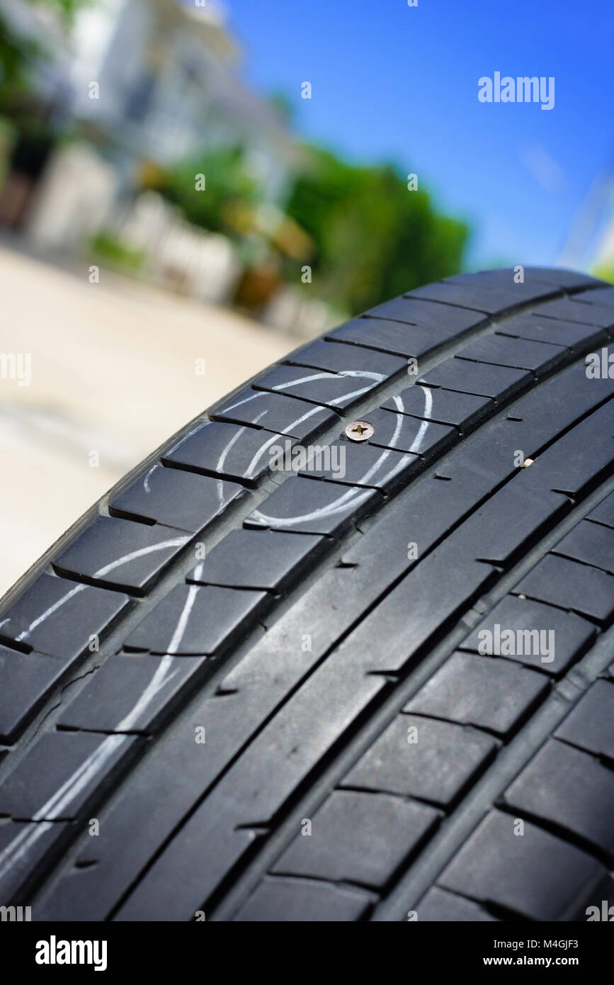 closeup of damaged car tire from screw Stock Photo - Alamy