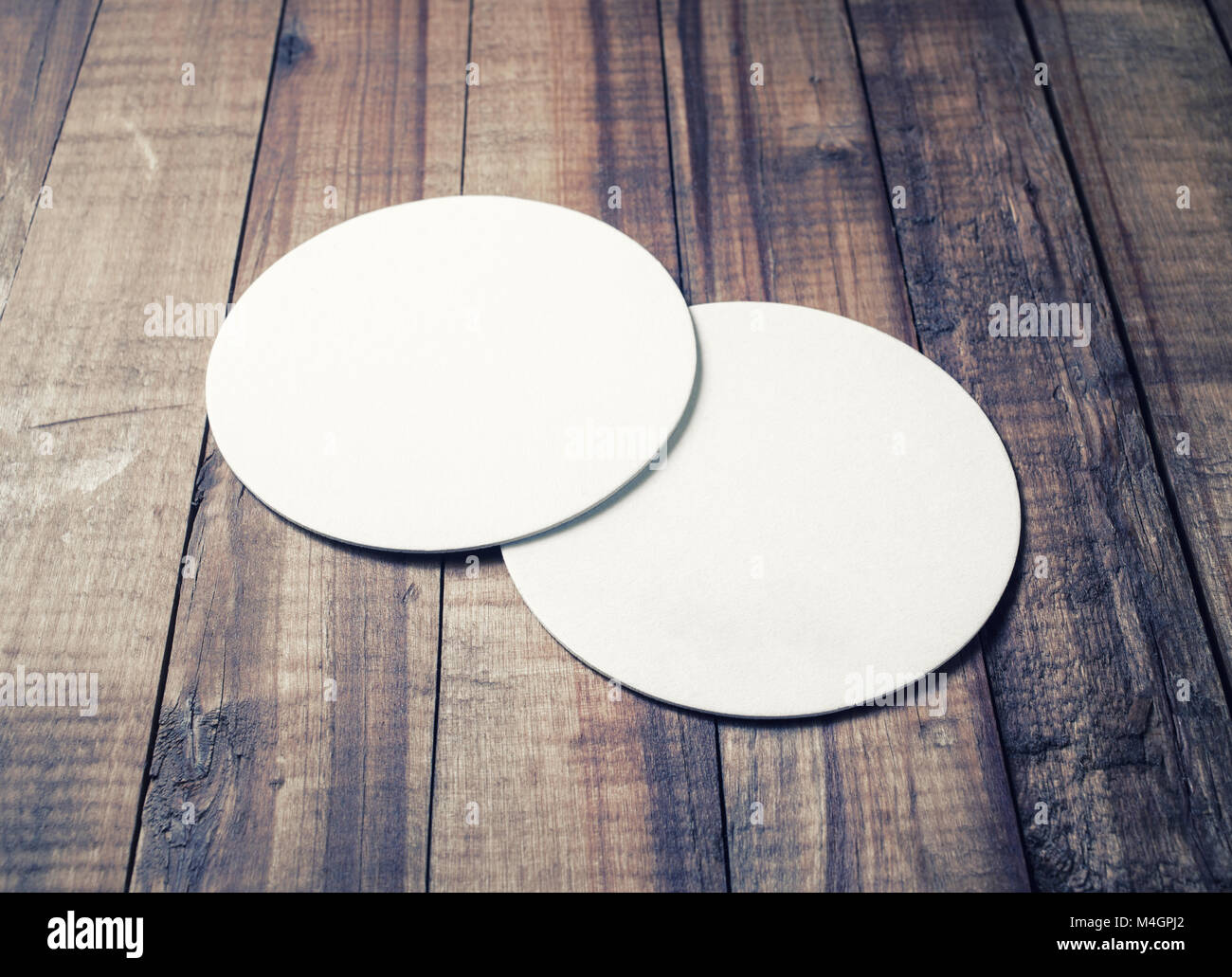 Two blank coasters Stock Photo - Alamy