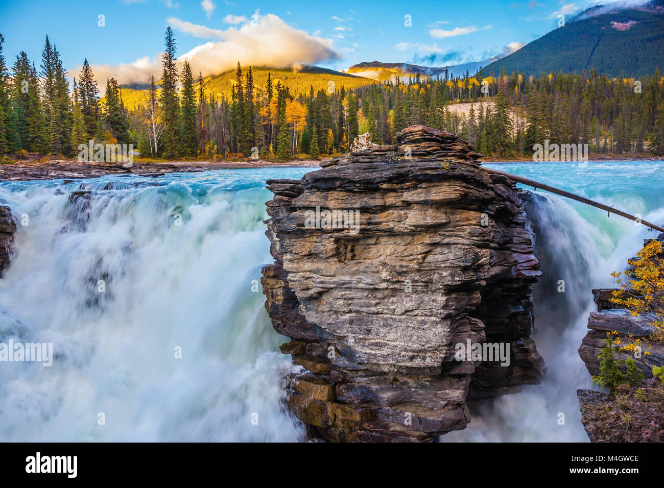 Sunset illuminates the surrounding mountains Stock Photo - Alamy