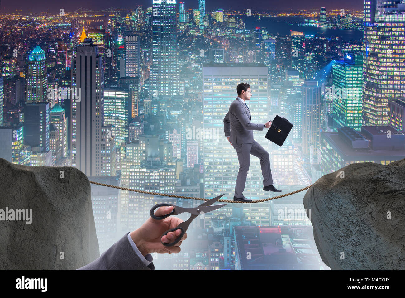 Businessman walking a tightrope hi-res stock photography and images - Alamy