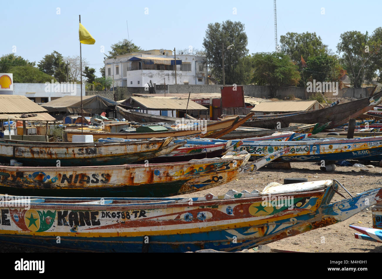 Artisanal wooden fishing boats (pirogues) in the Petite Côte, Senegal ...
