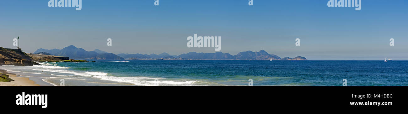 Devil beach and Rio de Janeiro hills panorama Stock Photo - Alamy