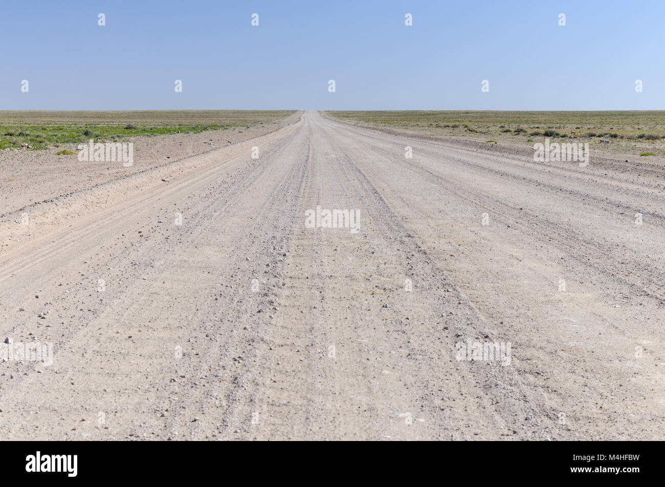 Landscape with straight road Stock Photo - Alamy
