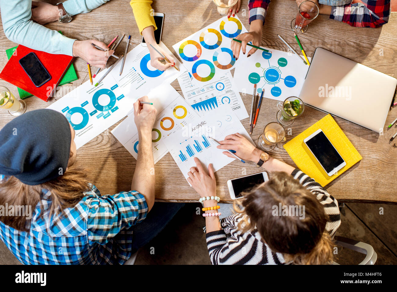 Group of people working at the table Stock Photo - Alamy