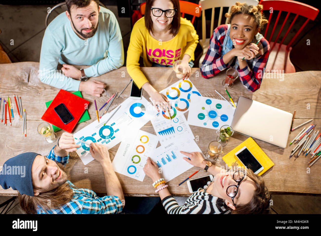 Group of people working at the table Stock Photo - Alamy