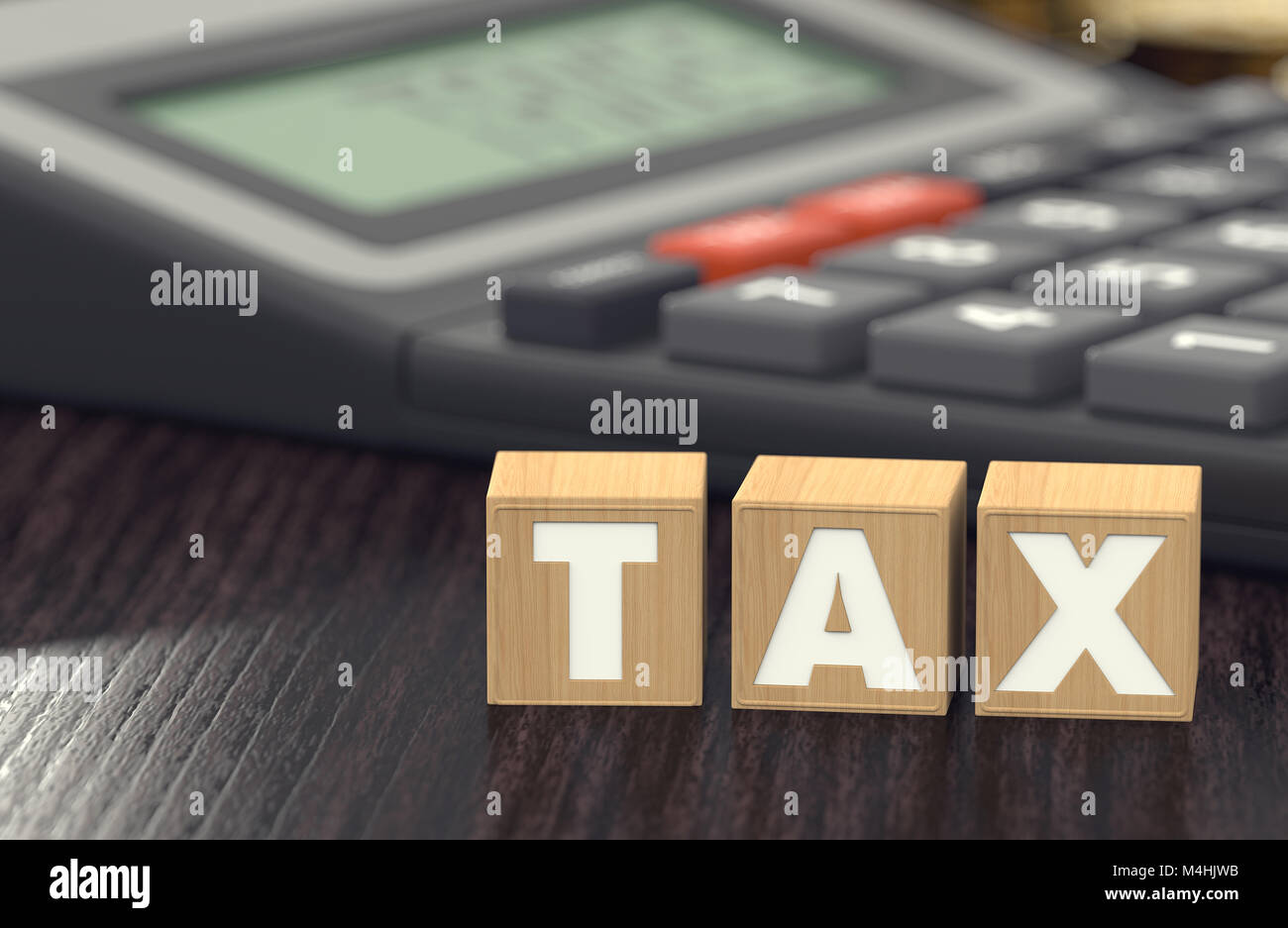 Tax Concept with wooden blocks in blurry close-up shot and calculator ...