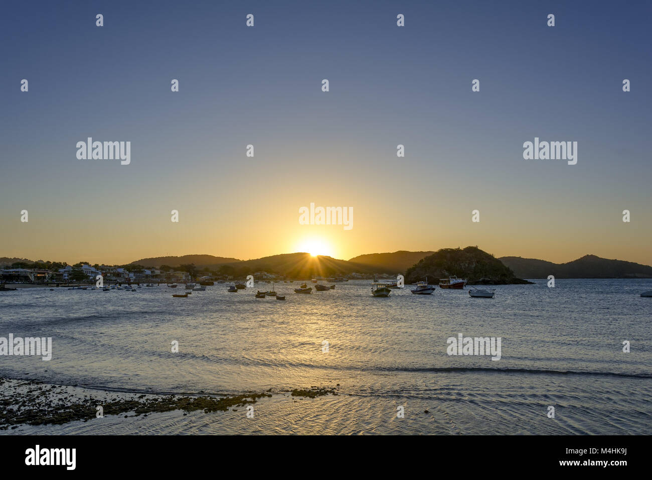 Buzios city sunset Stock Photo - Alamy