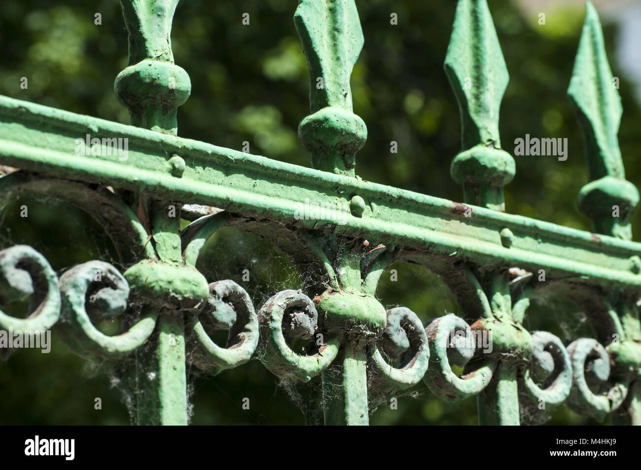 Old vintage iron fence closeup Stock Photo - Alamy