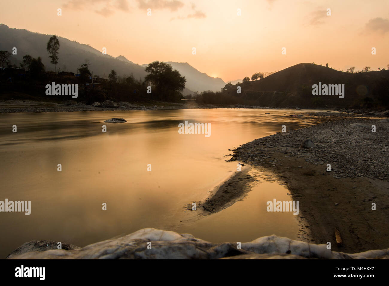 Sunset in Trisuli river, Nepal Stock Photo - Alamy