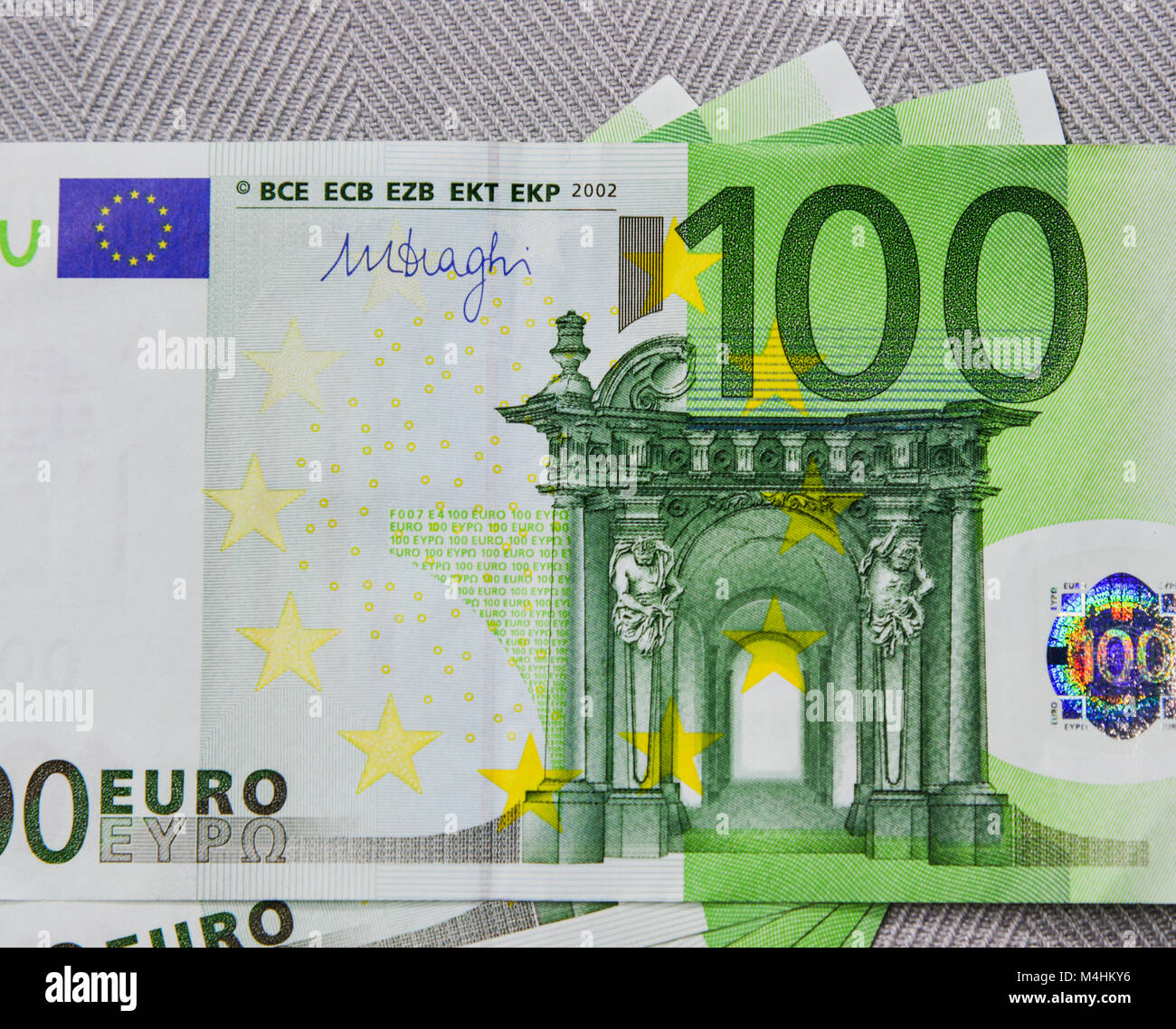 Group of Euro banknotes (100 EUR) on white background. Close up Stock ...