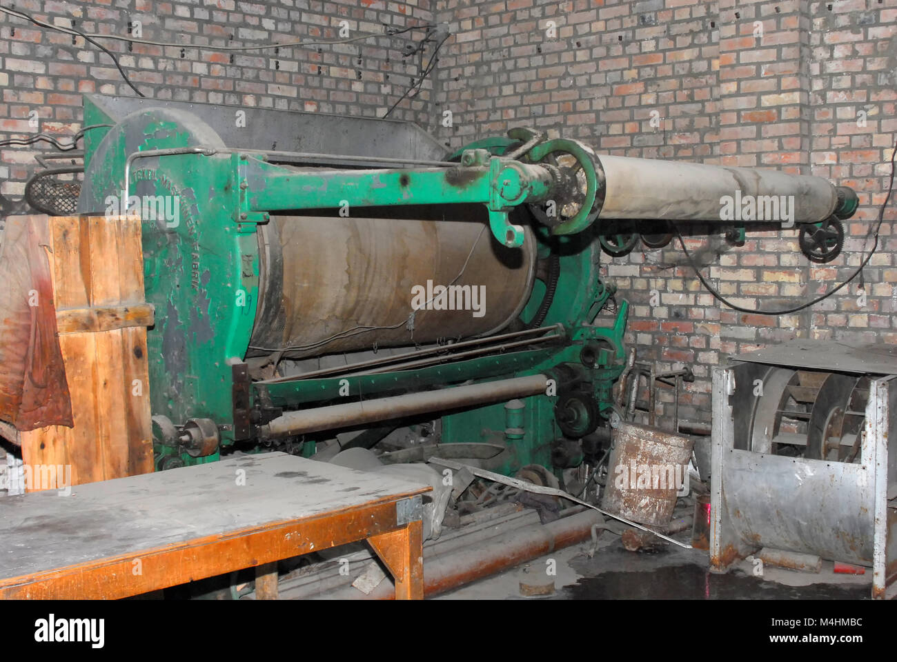 Old dysfunctional vintage machinery used for the production of textiles ...
