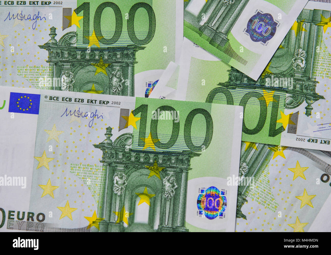 Group of 100 Euro bills (banknotes) money. European Union Currency ...