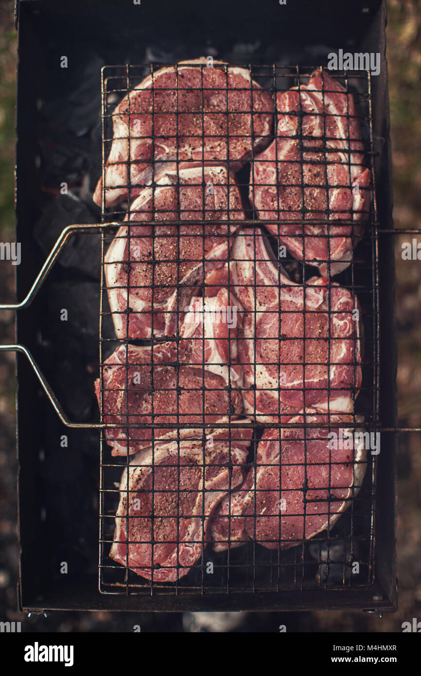 Grilling fresh entrecote pork Stock Photo - Alamy