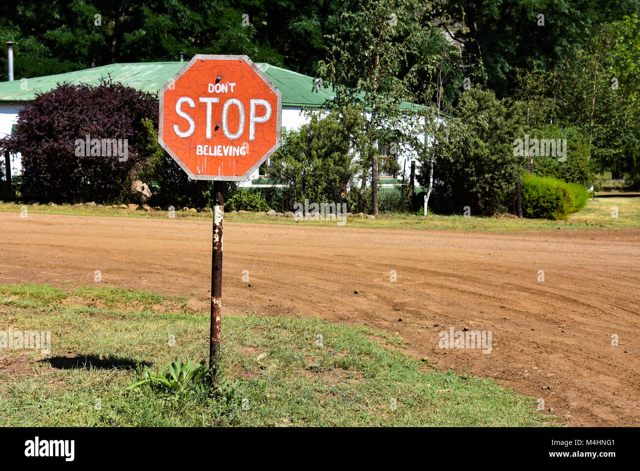 A stop sign in Rhodes South Africa in the Eastern Cape saying don't ...