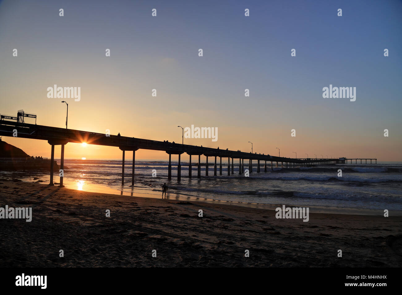 The sunset over the Ocean Beach Pier near San Diego, California Stock ...