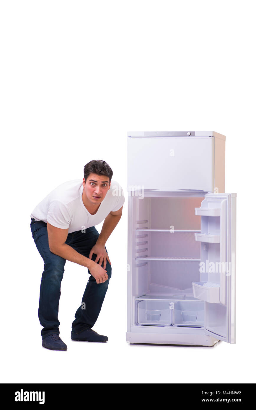 Man looking for food in empty fridge Stock Photo - Alamy