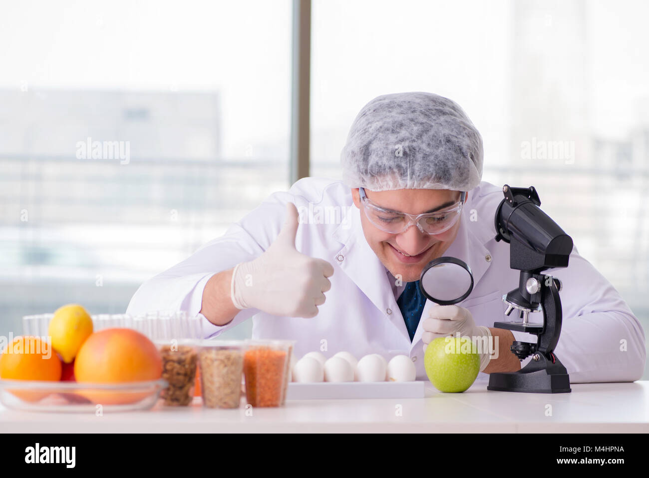 Nutrition expert testing food products in lab Stock Photo - Alamy