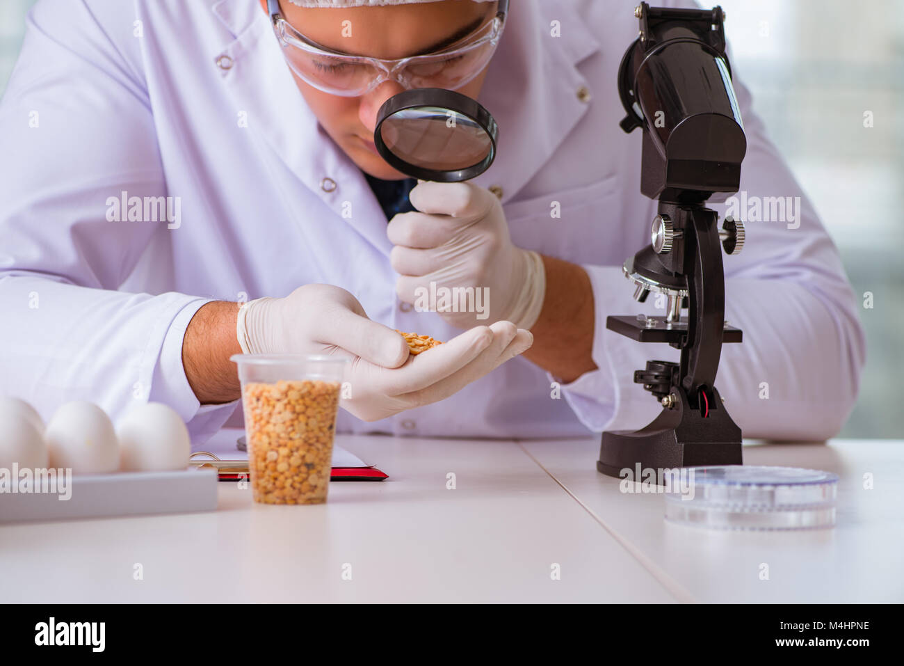 Nutrition expert testing food products in lab Stock Photo - Alamy
