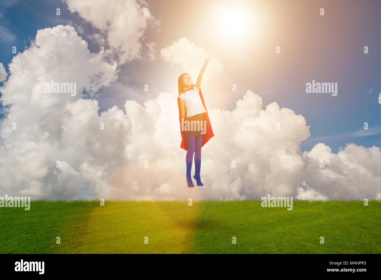 Superhero kid flying in dream concept Stock Photo - Alamy