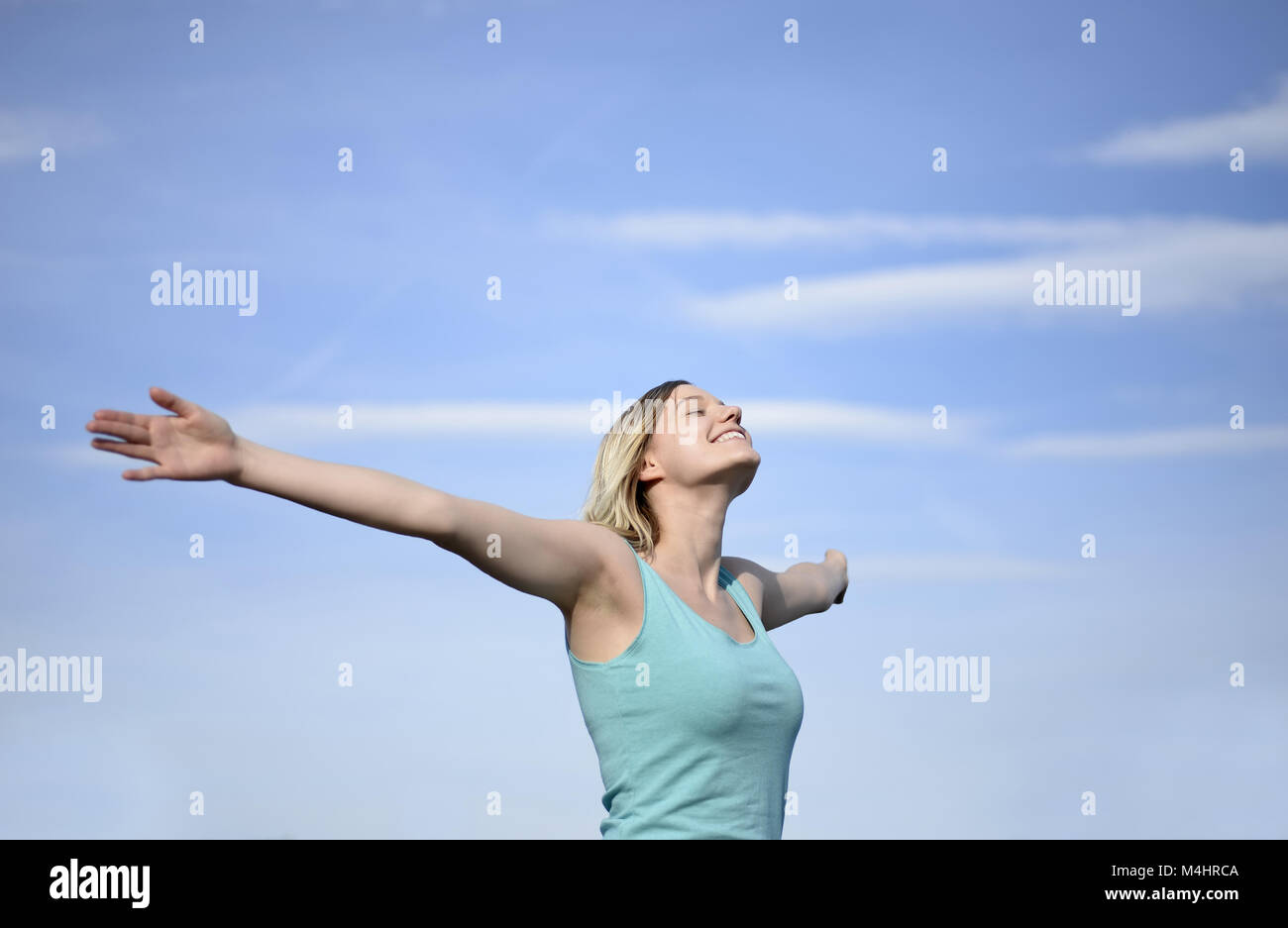 young woman cheering Stock Photo - Alamy