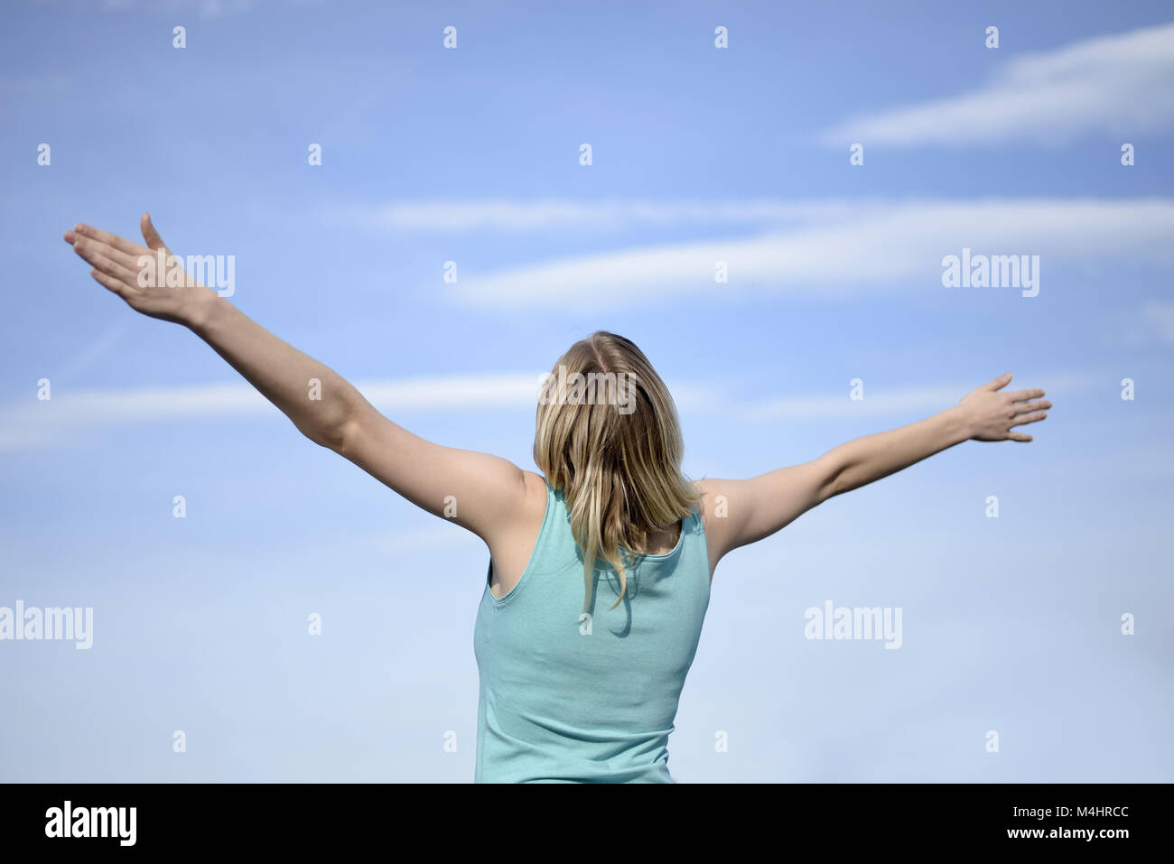 young woman cheering Stock Photo - Alamy