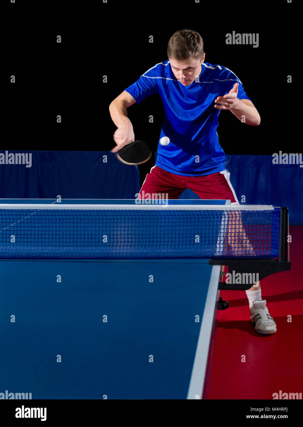 Young table tennis player isolated Stock Photo - Alamy