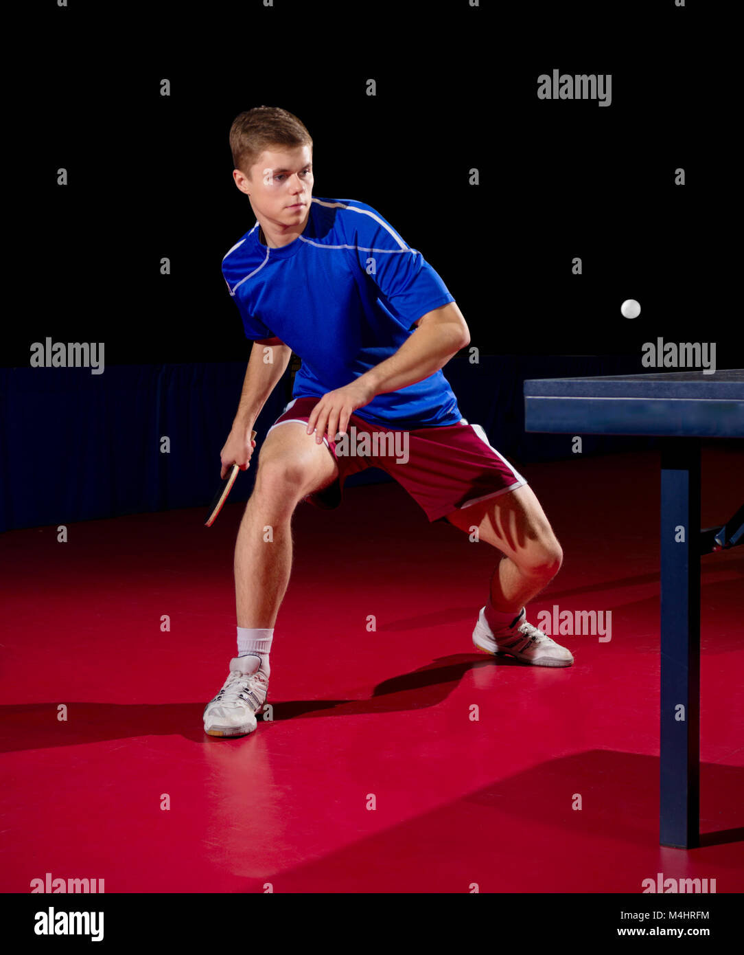 Young table tennis player isolated Stock Photo - Alamy