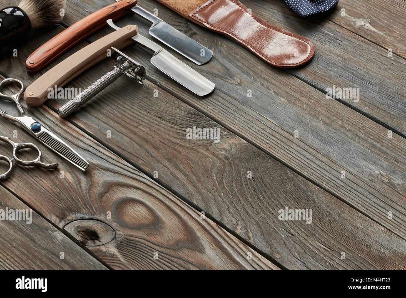 Vintage barber shop tools on wooden background Stock Photo - Alamy