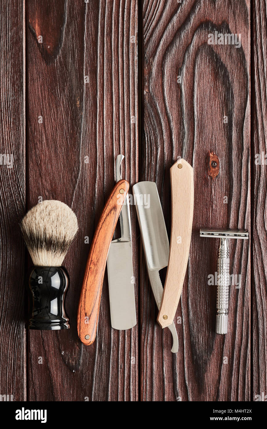 Vintage barber shop tools on wooden background Stock Photo - Alamy