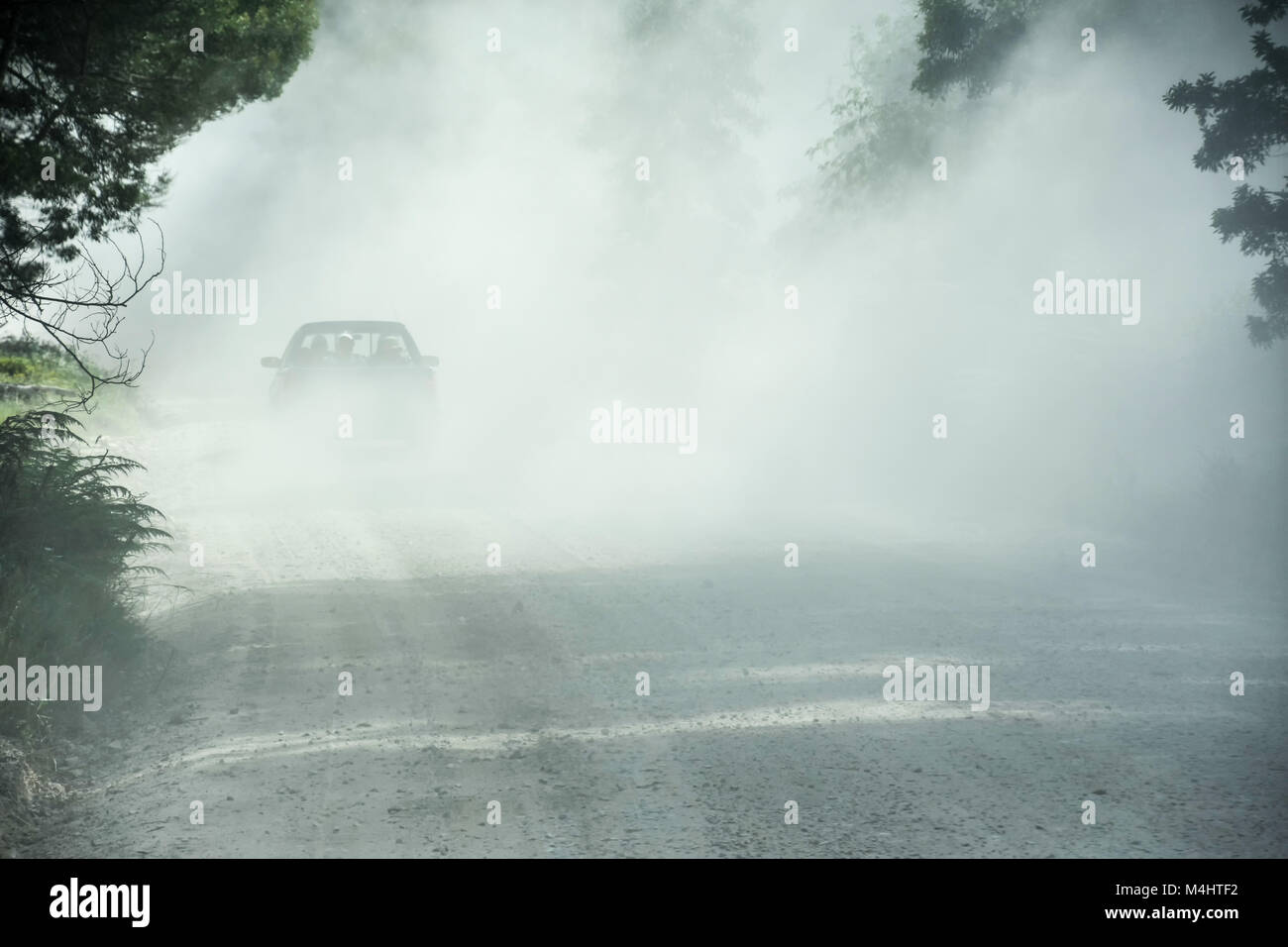 Car in cloud dust hi-res stock photography and images - Alamy