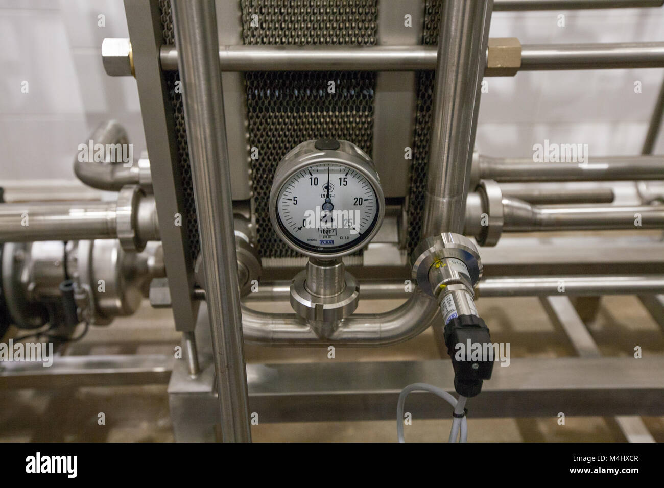 Pressure gauge (manometer) of white metal - brewing equipment. Close-up ...