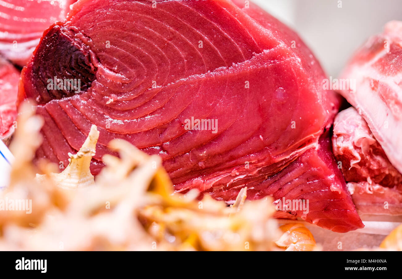 Fresh tuna fish on market display Stock Photo - Alamy