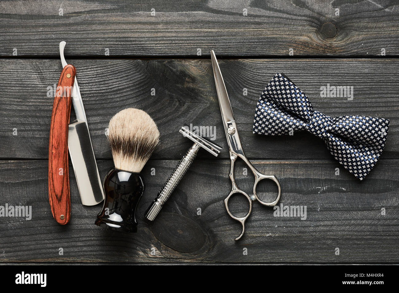 Vintage barber shop tools on wooden background Stock Photo - Alamy