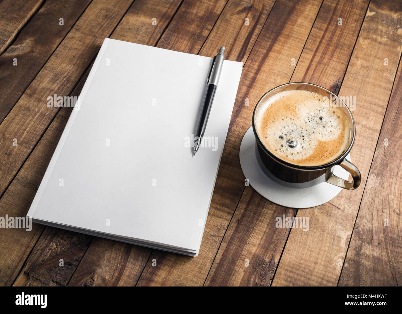 Book, pencil, coffee cup Stock Photo - Alamy