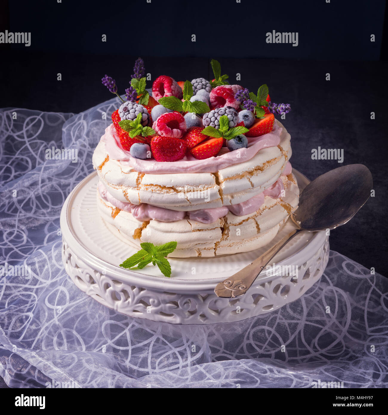 Pavlova with berry fruits Stock Photo - Alamy