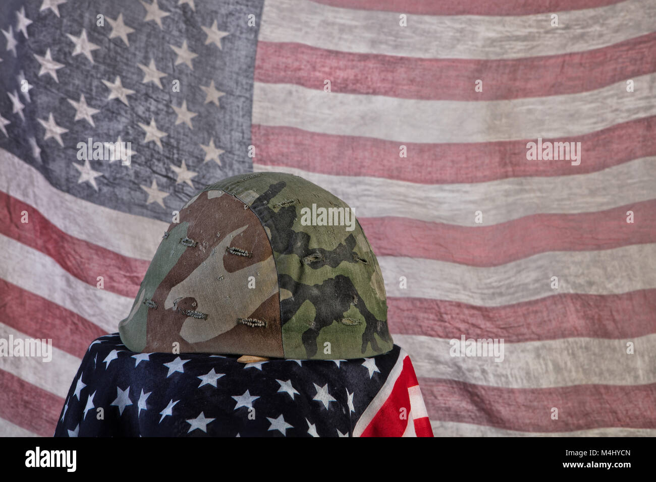 Old Army Helmet And Flag Stock Photo - Alamy