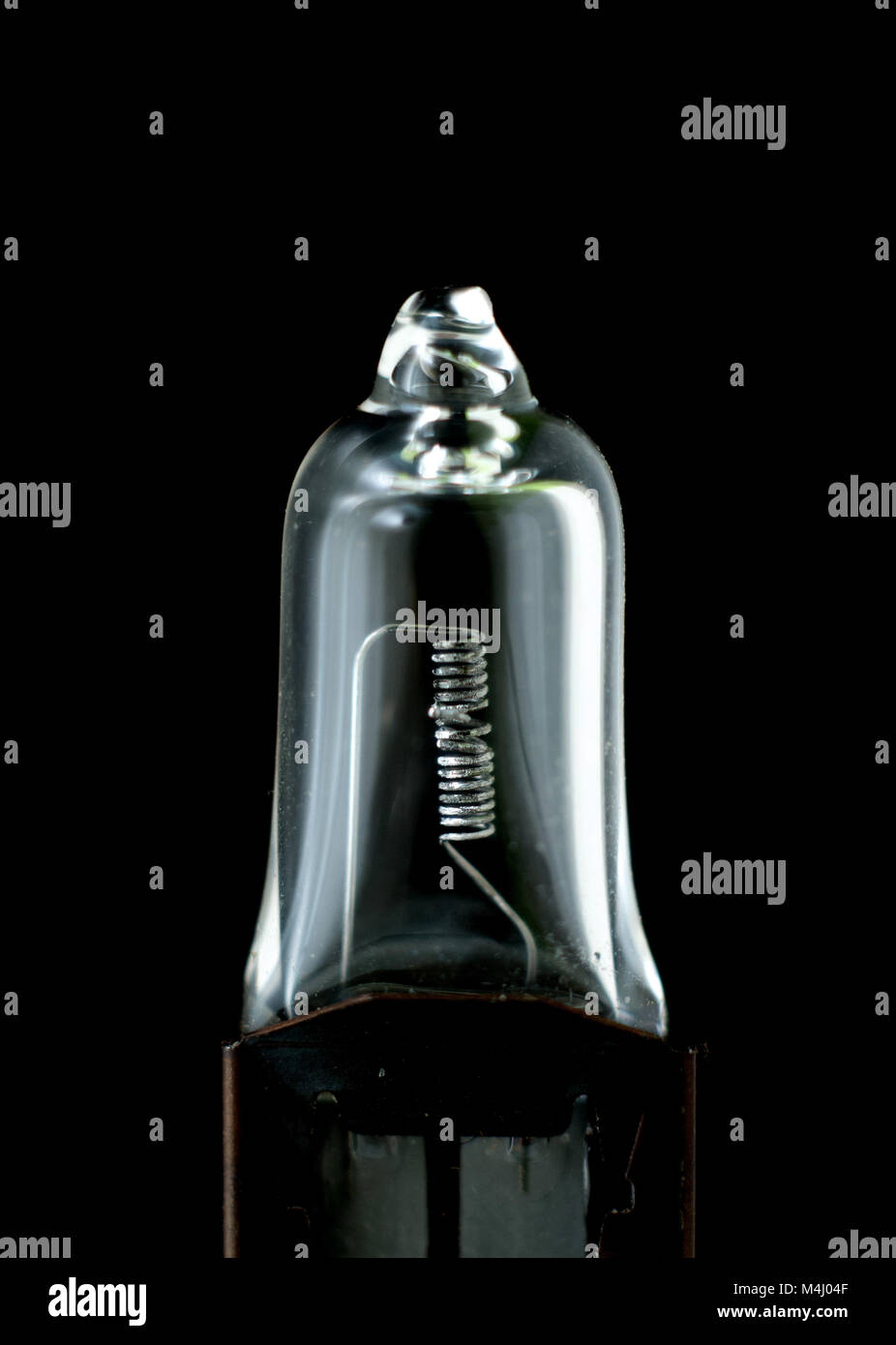 damaged Spare lightbulb for a car's headlights isolated on black ...