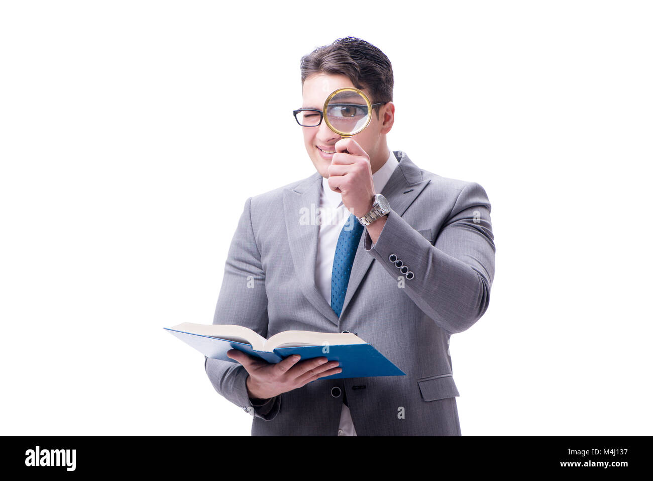 Businessman reading with magnifying glass isolated on white back Stock ...