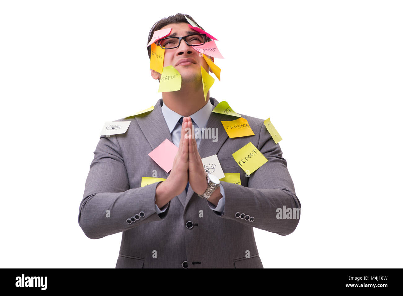 Businessman with many reminders isolated on white Stock Photo - Alamy