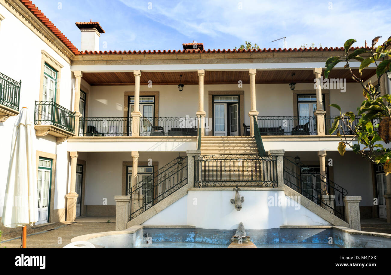 Classic house with verandah, granite staircase and water feature in the ...