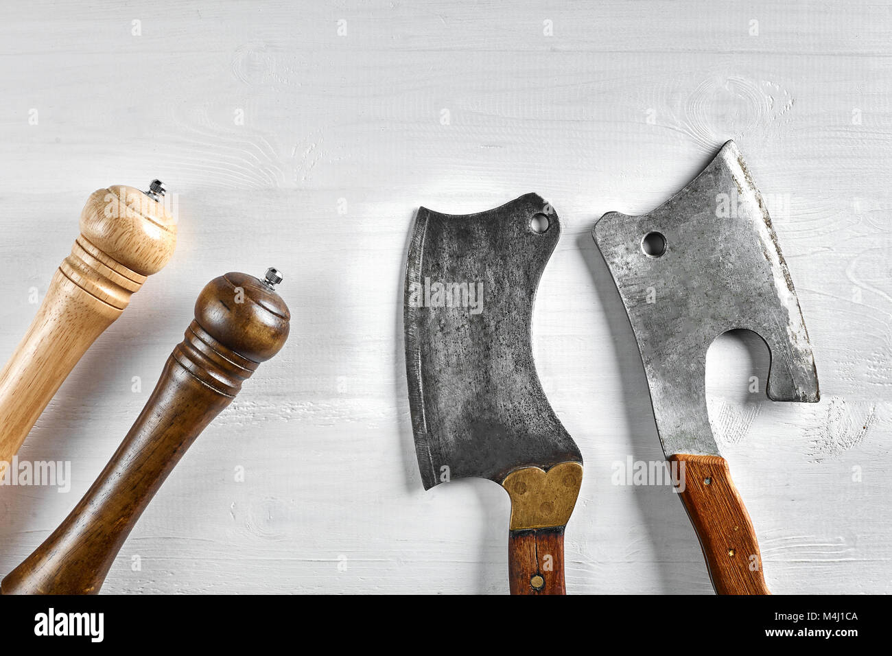 Kitchen ax, knife, cleaver, cutter with wooden handle. Axe on light ...