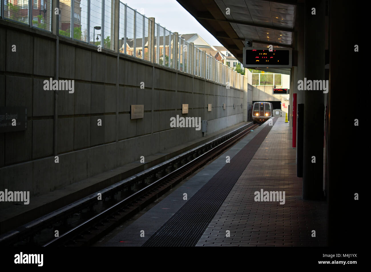 Morgan Blvd platform at Metro Station in Maryland with train leaving ...