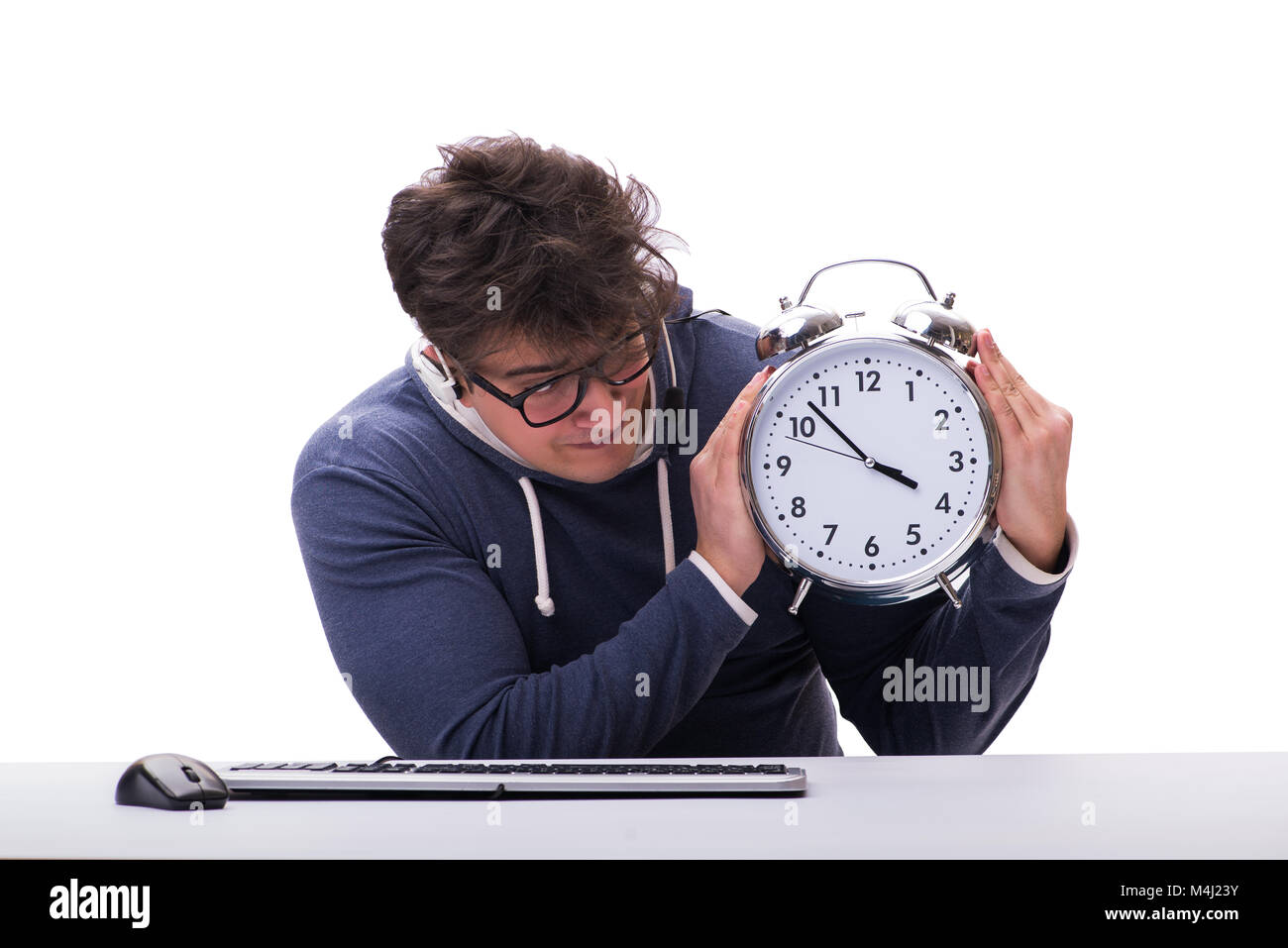 Funny nerd call center operator with giant clock Stock Photo - Alamy