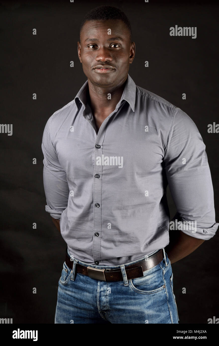 African man arms behind head hi-res stock photography and images - Alamy