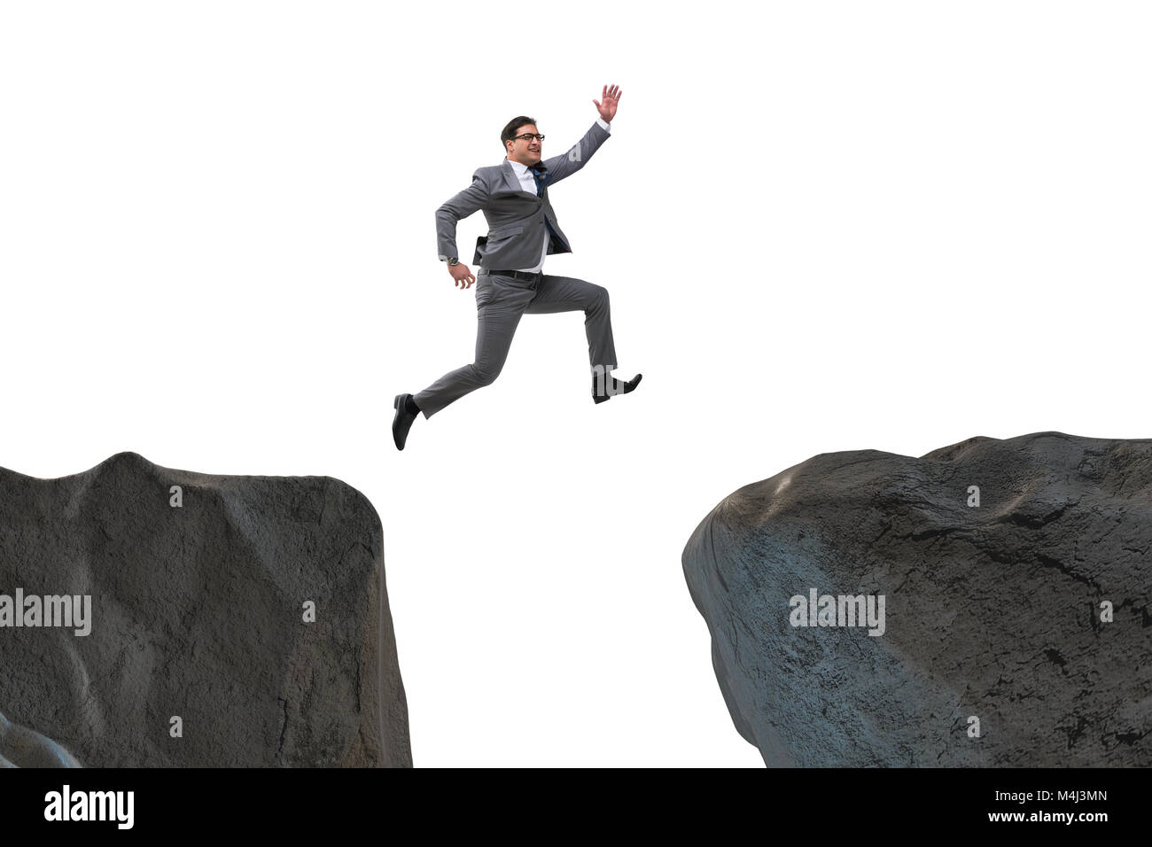 Ambitious businessman jumping over the cliff Stock Photo - Alamy