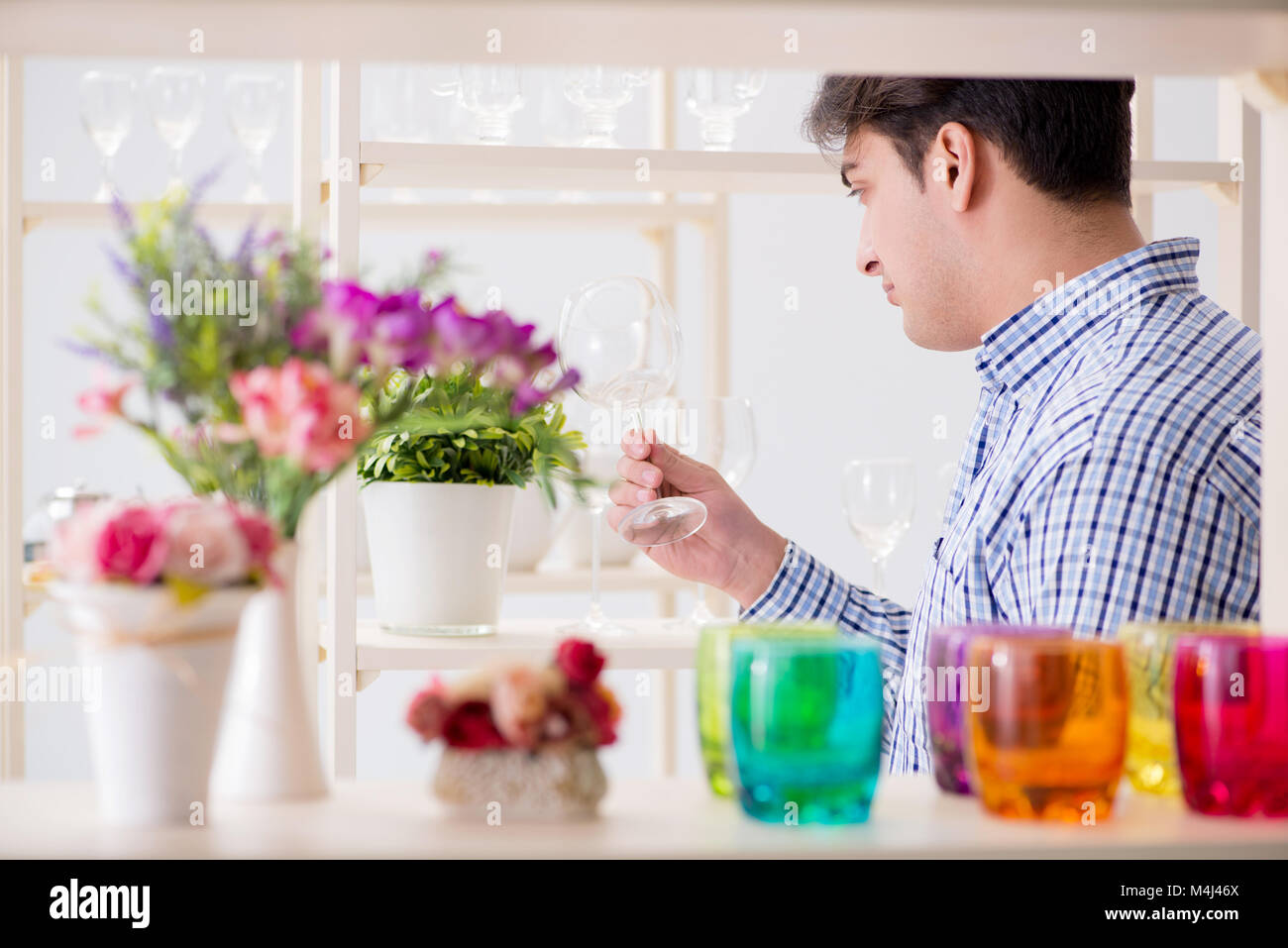 Young handsome man shopping in shop Stock Photo - Alamy