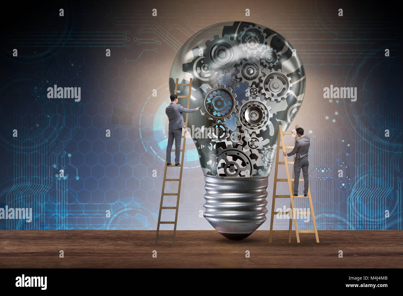 Businessman on ladder repairing light bulb Stock Photo - Alamy