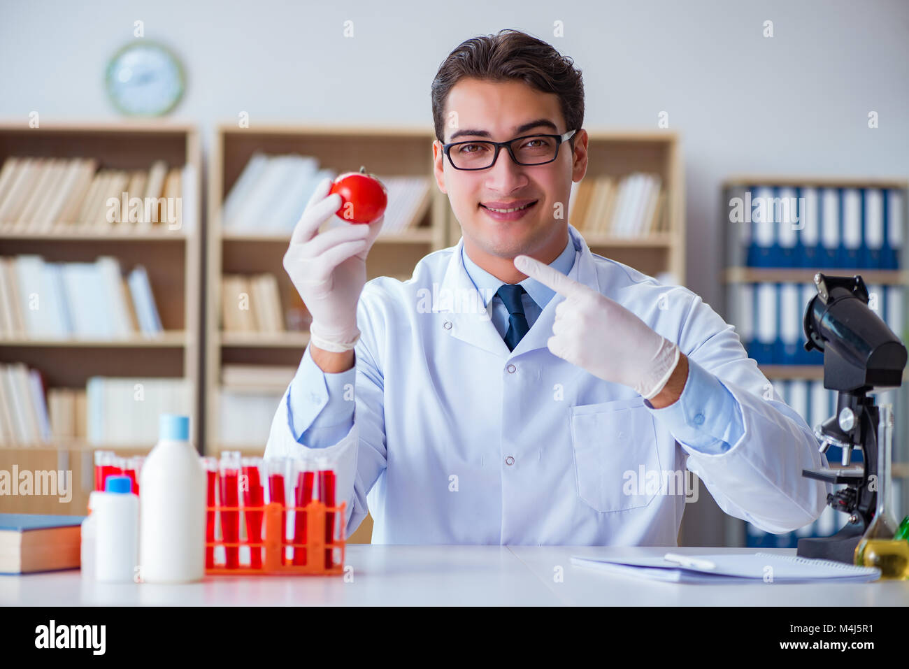 Scientist working on organic fruits and vegetables Stock Photo - Alamy
