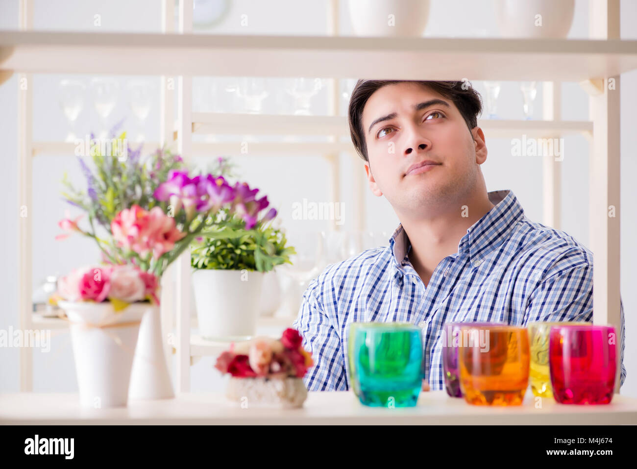 Young handsome man shopping in shop Stock Photo - Alamy